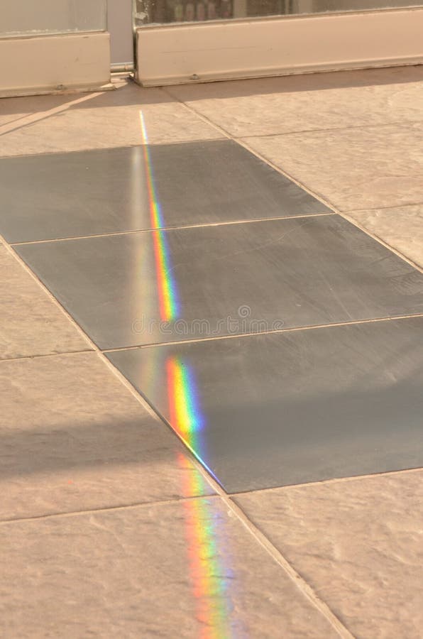 Rainbow on the floor stock image. Image of prism, glass - 125775105