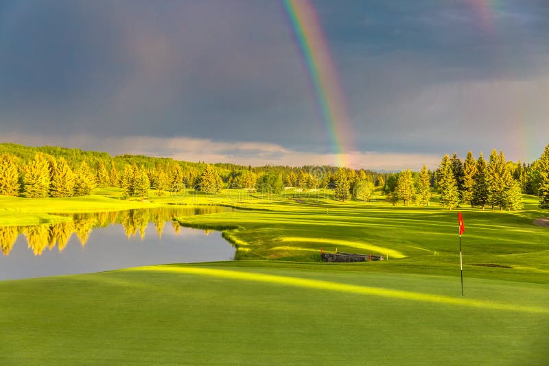 Rainbow on the golf course stock image. Image of hits - 118983579