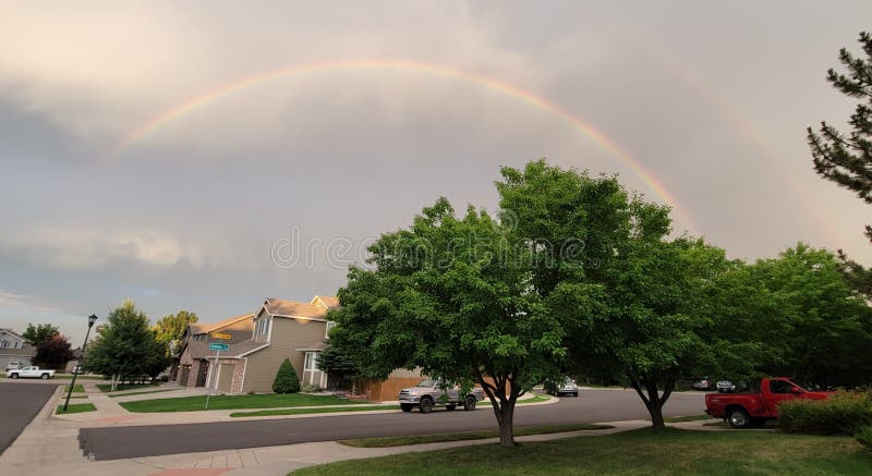 Rainbow houses pretty stock photo. Image of wind, green - 232051960