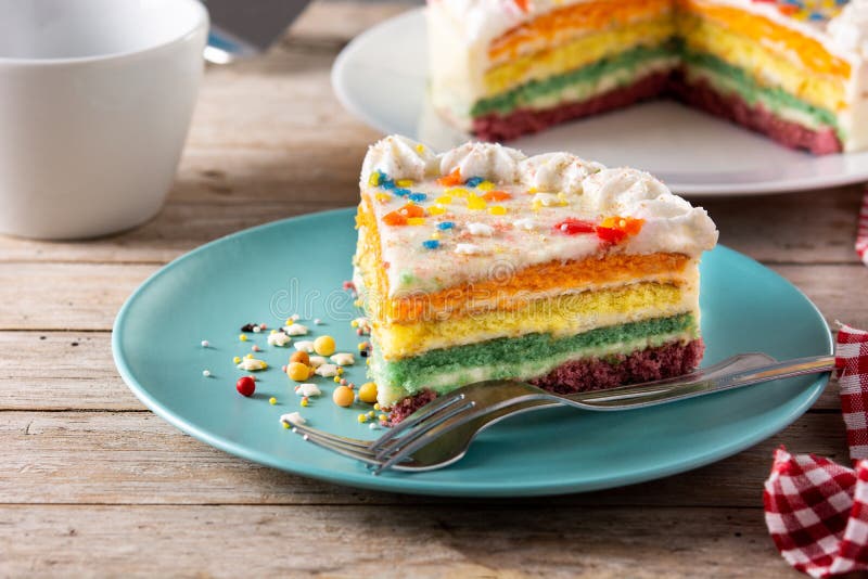 Rainbow layer cake piece stock image. Image of dessert - 232467979