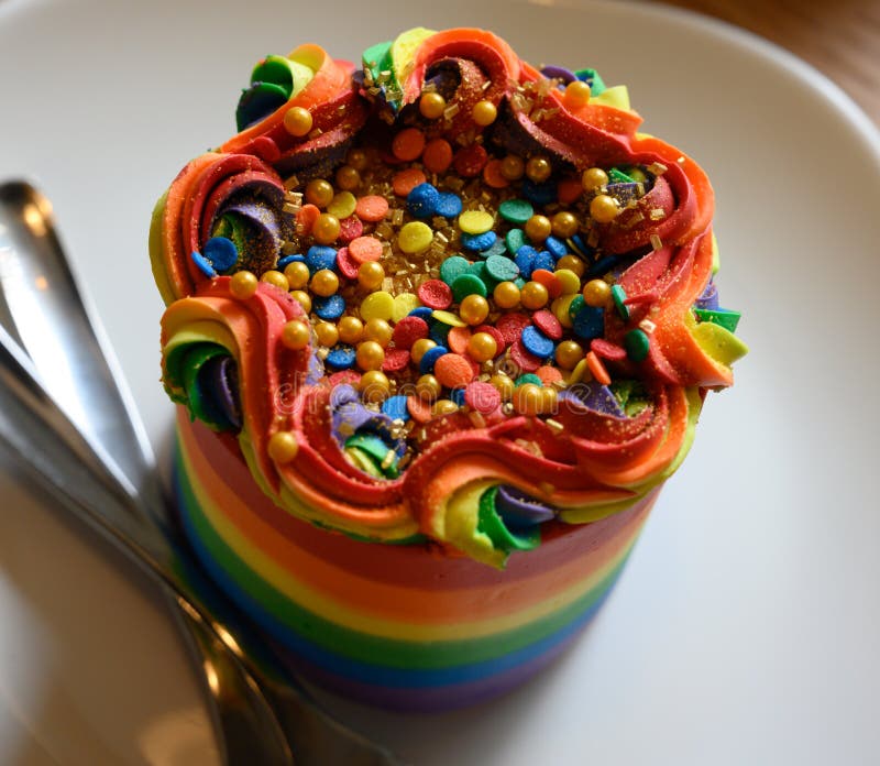 Rainbow Mini Cake with Sprinkles Stock Photo - Image of frosting ...