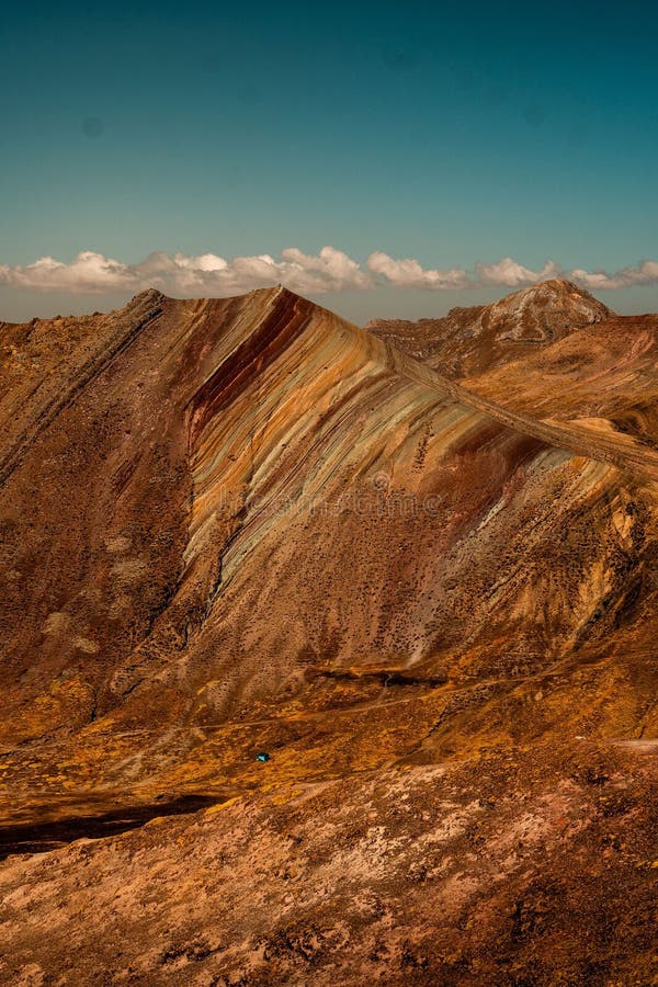 Rainbow Mountain in Peru Under a Clear Blue Sky Stock Image - Image of ...