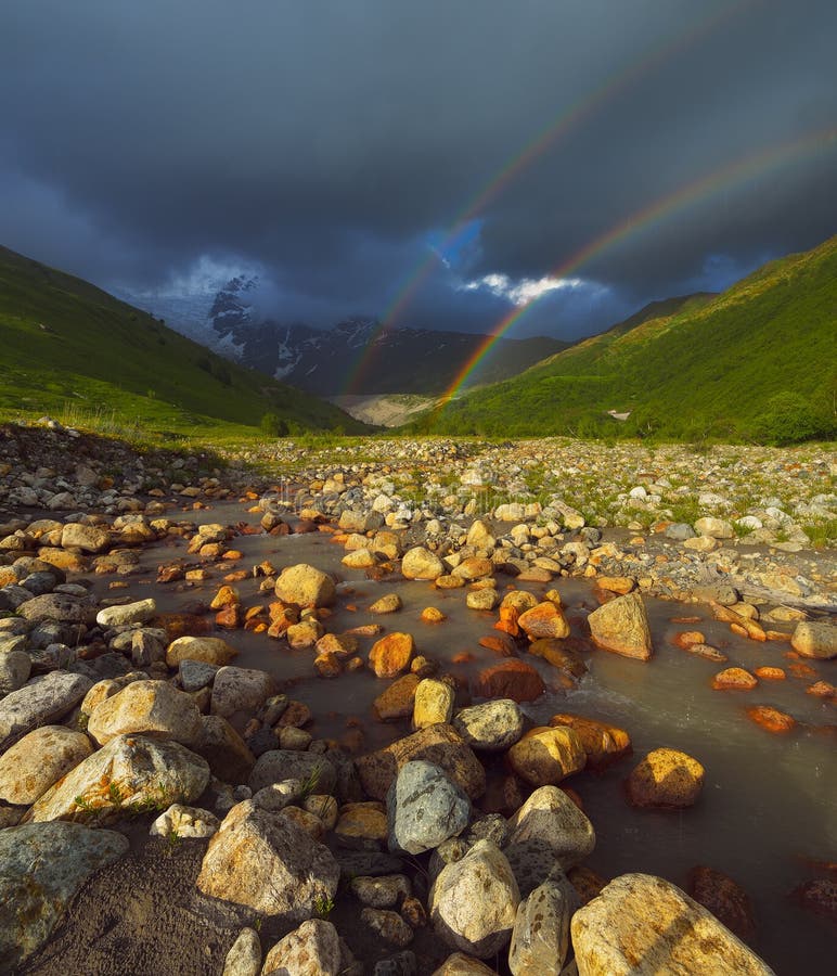 Rainbow in the mountains stock image. Image of color - 53065257