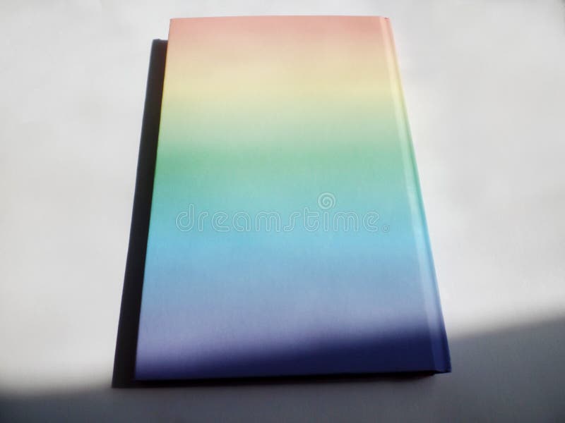 Rainbow Notepad on a White Background Stock Image - Image of colored ...