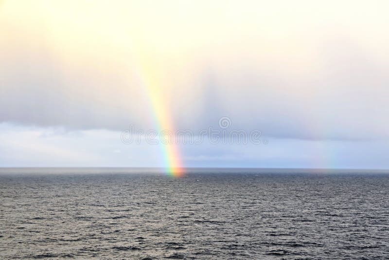Rainbow in the Ocean after Rain and Thunderstorm.North Pacific Ocean ...