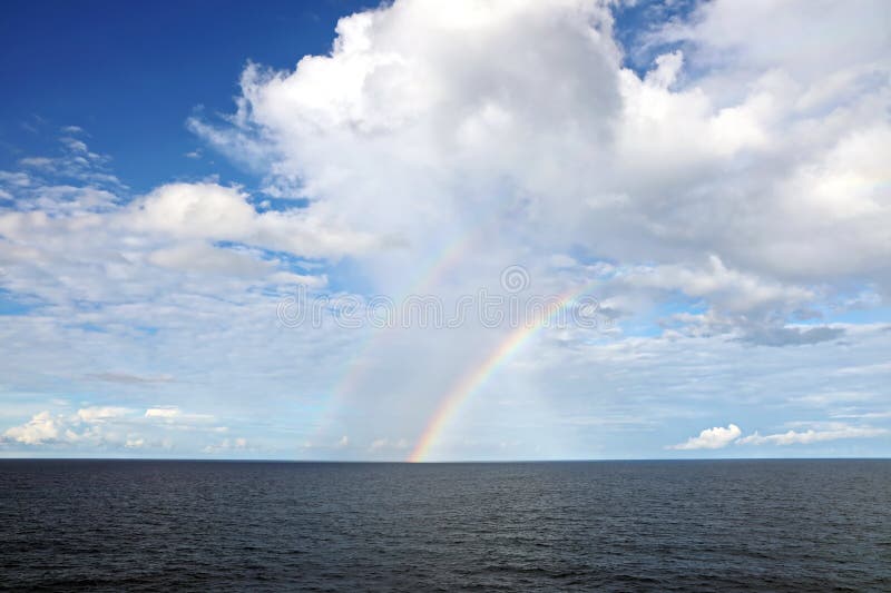 Rainbow in the Ocean after Rain and Thunderstorm.North Pacific Ocean ...