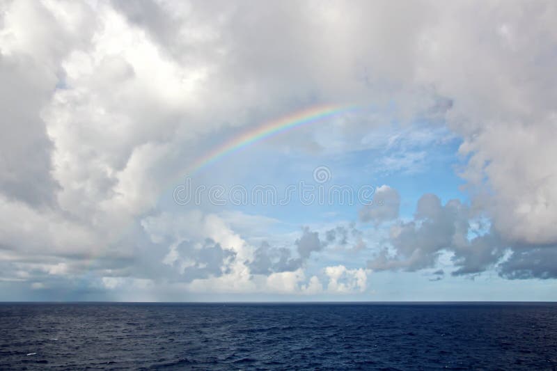 Rainbow in the Ocean after Rain and Thunderstorms. Stock Image - Image ...