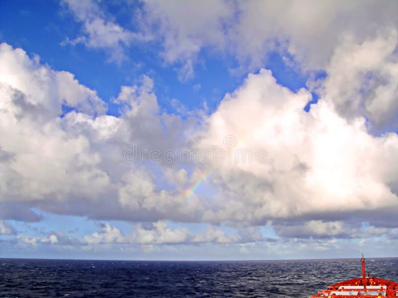 Rainbow in the Ocean after Rain and Thunderstorms. Stock Photo - Image ...