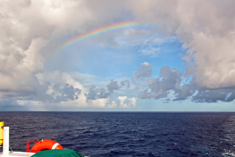 Rainbow in the Ocean after Rain and Thunderstorms. Stock Photo - Image ...