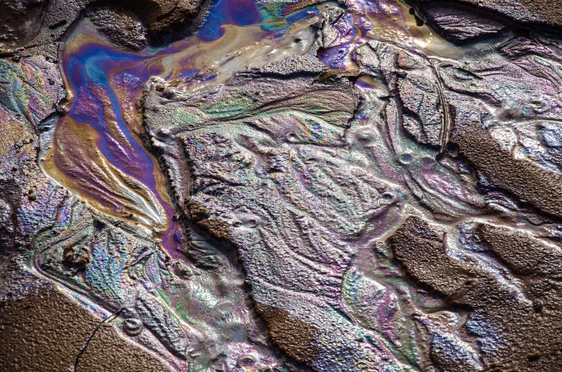Rainbow oil slick stock photo. Image of color, ecology - 76840434