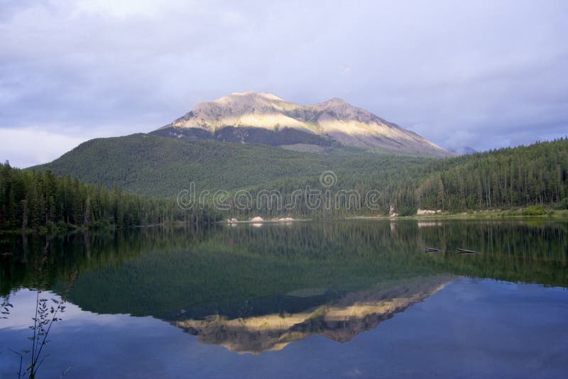 Rainbow Over the Alces Lake in the Break of Dawn Stock Image - Image of ...