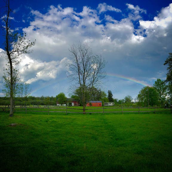 Rainbow stock image. Image of rainbow, barn, blue - 150183925