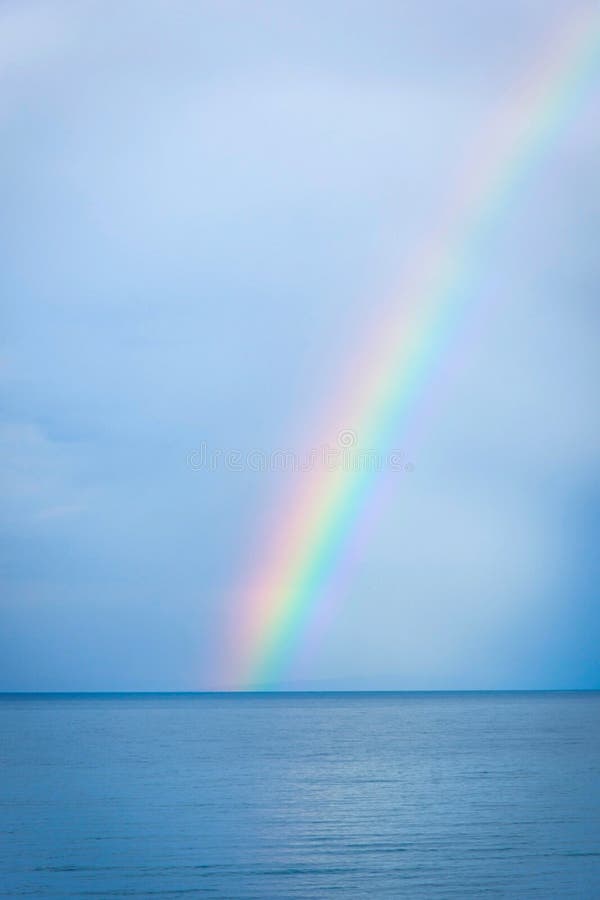 Rainbow Over the Blue Water Stock Image - Image of bright, nature ...