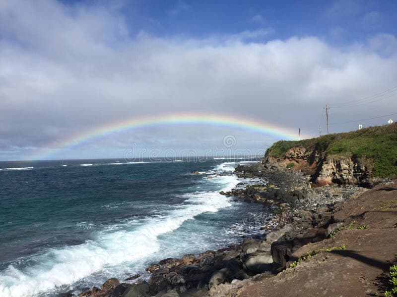 Rainbow over cliff stock image. Image of maui, ocean - 91727529