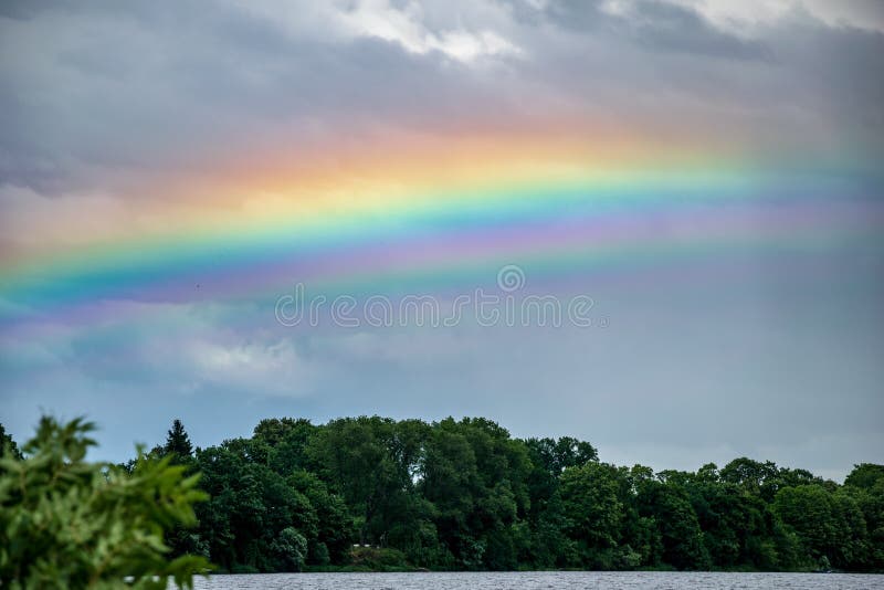 Rainbow in the country stock image. Image of rainbow - 145953841