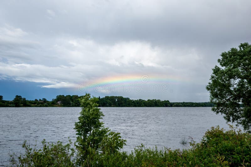 Rainbow in the country stock photo. Image of rainbow - 145953882