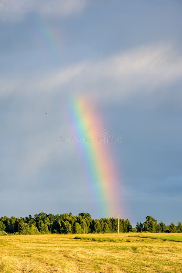 Rainbow in the country stock photo. Image of rainbow - 145953882