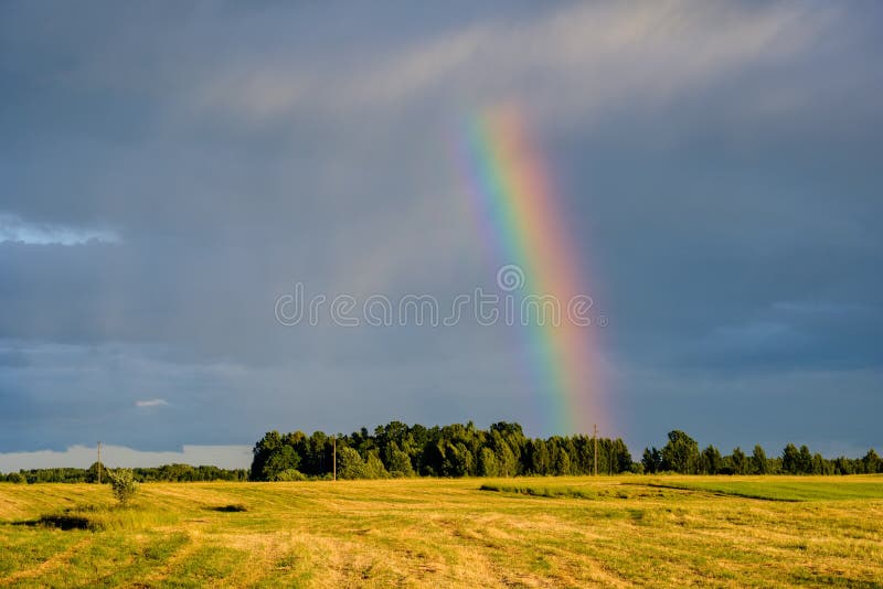 Rainbow in the country stock photo. Image of rainbow - 145953882