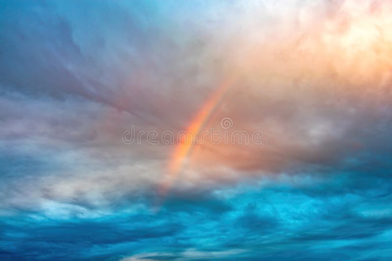 Rainbow Over Cumulus and Cirrus Cloudy Dramatic Gloomy Sky Stock Image ...