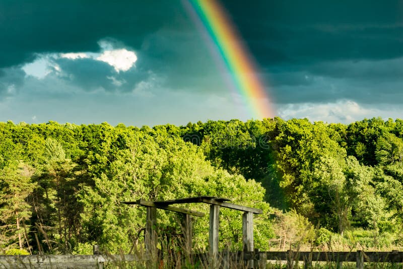 Rainbow over a Farm Field stock image. Image of outdoors - 18891173