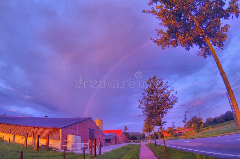 Rainbow over the farm stock image. Image of farmland - 57522581