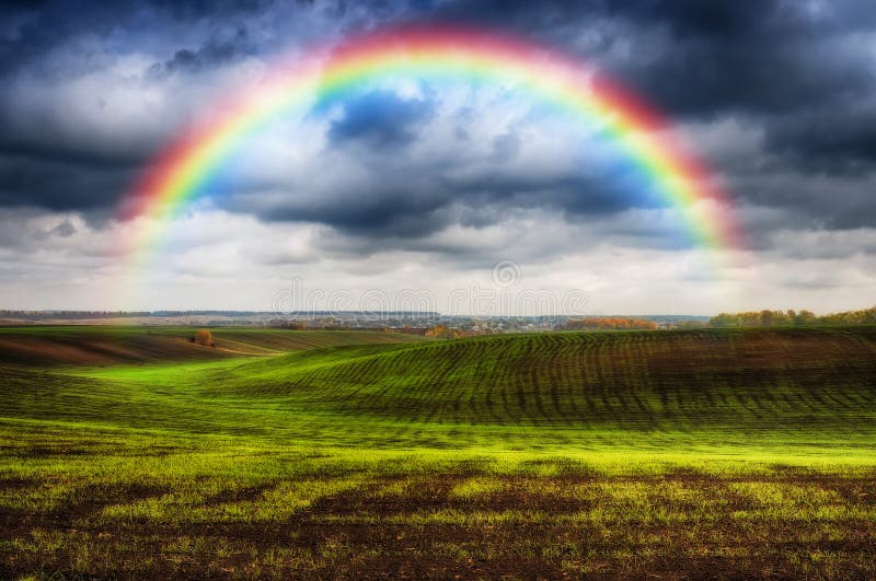 Rainbow over the field stock image. Image of brim, countrified - 165750369