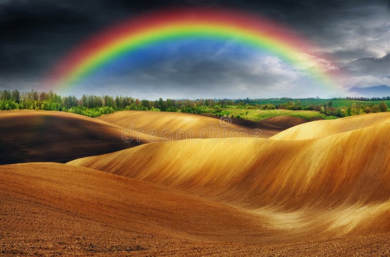 Rainbow over the field stock image. Image of landscape - 165750379
