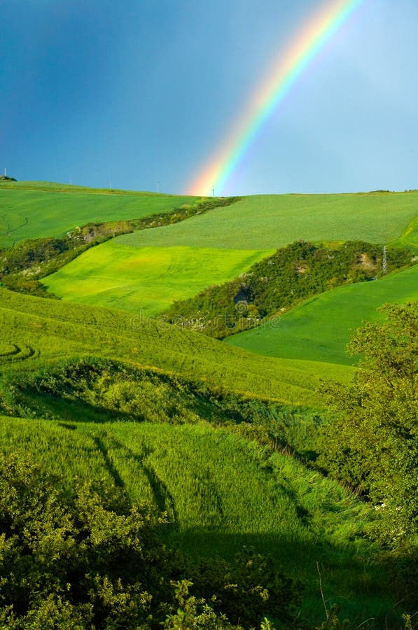 Rainbow over fields stock image. Image of land, growth - 2491307