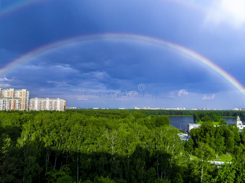 Rainbow Over Forest and Calm Lake Water in Moscow. General Plan Stock ...