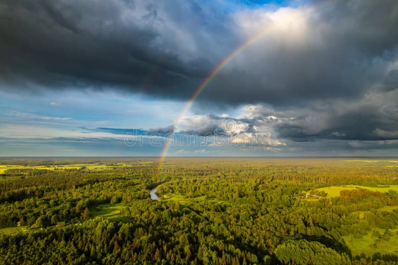 Rainbow Over the Forest on a Rainy Day Stock Image - Image of ...