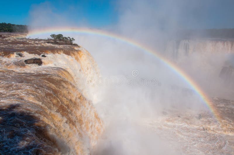 Rainbow Over Gorgeous Waterfalls of Iguazu, Brazil Stock Photo - Image ...