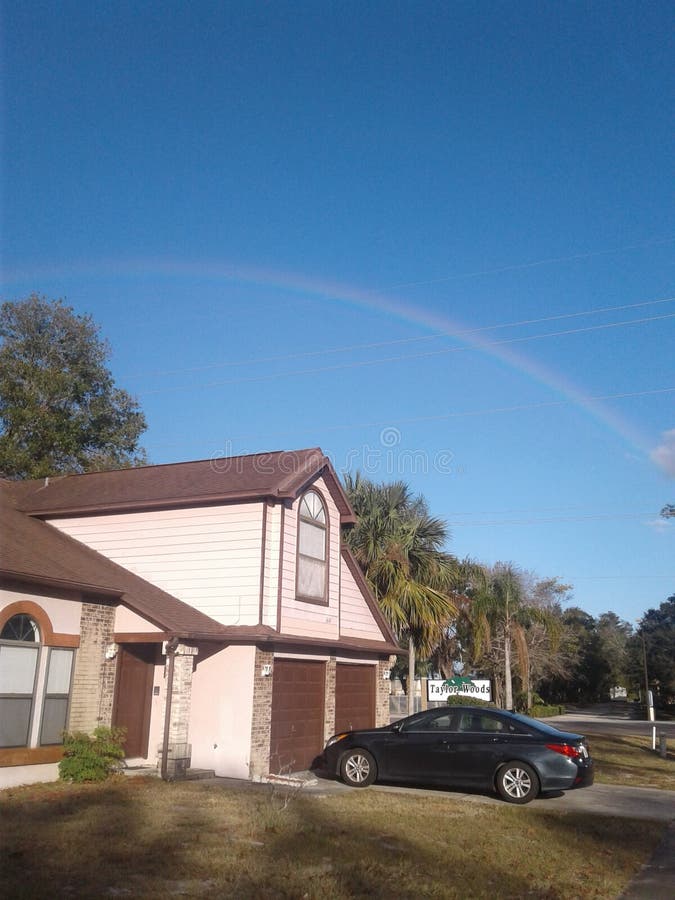 Rainbow over house stock image. Image of mast, facade - 266039315