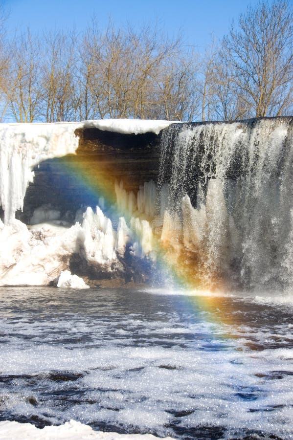 Rainbow Over Iced Waterfall Picture. Image: 3766623