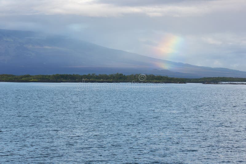 Rainbow Over Isabela with Shield Volcano. Stock Photo - Image of ...