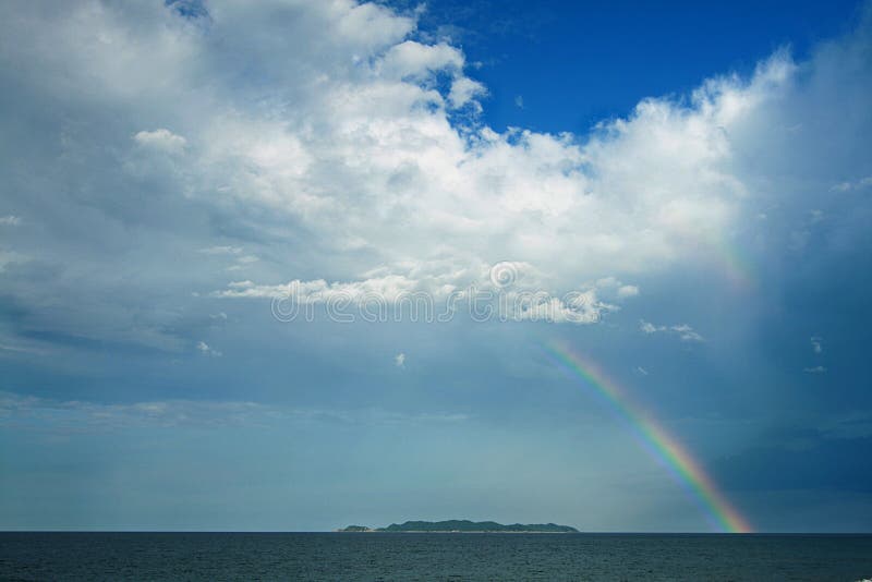 Rainbow over the island stock image. Image of orange - 41571687