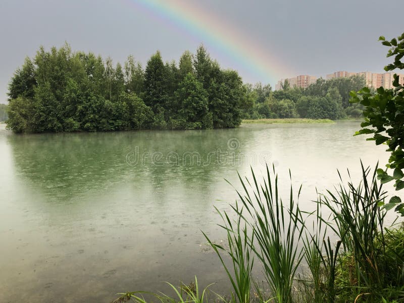 Rainbow Over Lake Durind Rain Stock Image - Image of river, water ...