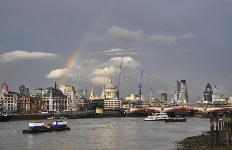 A rainbow over London stock photo. Image of crane, building - 22790356