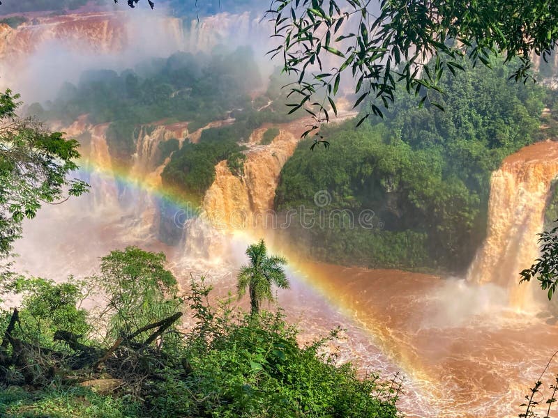 Rainbow Over the Majestic Waterfall Stock Photo - Image of nature ...