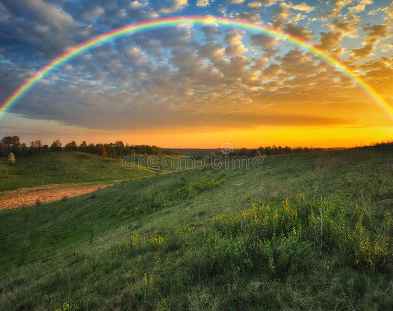 Rainbow over the meadow stock image. Image of haze, dramatic - 188097717