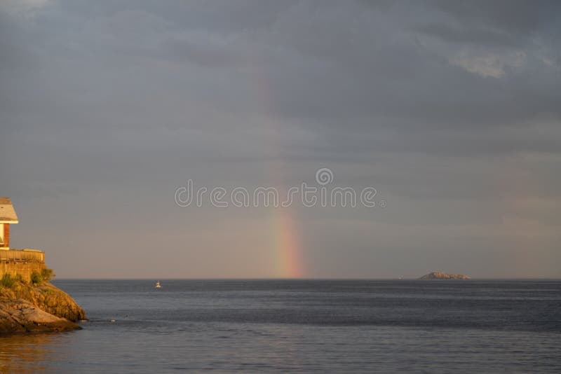 Rainbow Over Ocean at Sunset Stock Image - Image of coast, stormy ...