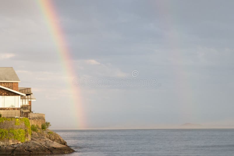 Rainbow Over Ocean at Sunset Stock Image - Image of stormy, weather ...