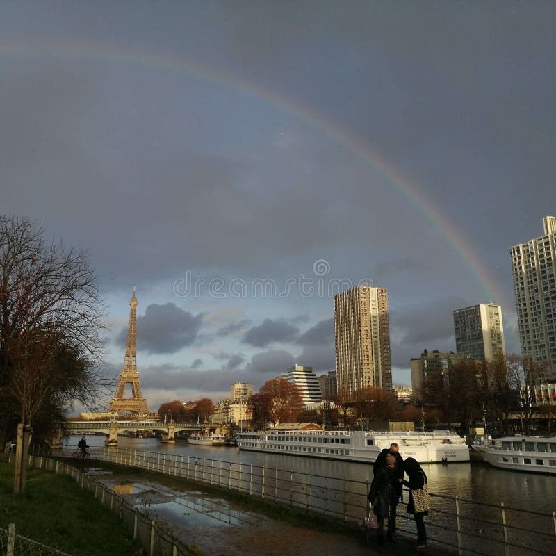 Rainbow over the Paris editorial photography. Image of eiffeltower ...