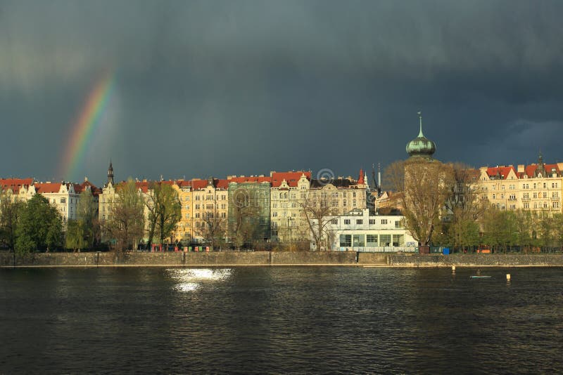 Rainbow over Prague stock photo. Image of embankment - 24439334