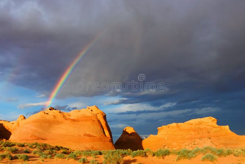Rainbow over red rocks stock photo. Image of clouds, lake - 26189814