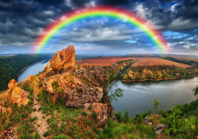 Rainbow over the river stock image. Image of nature - 166362065