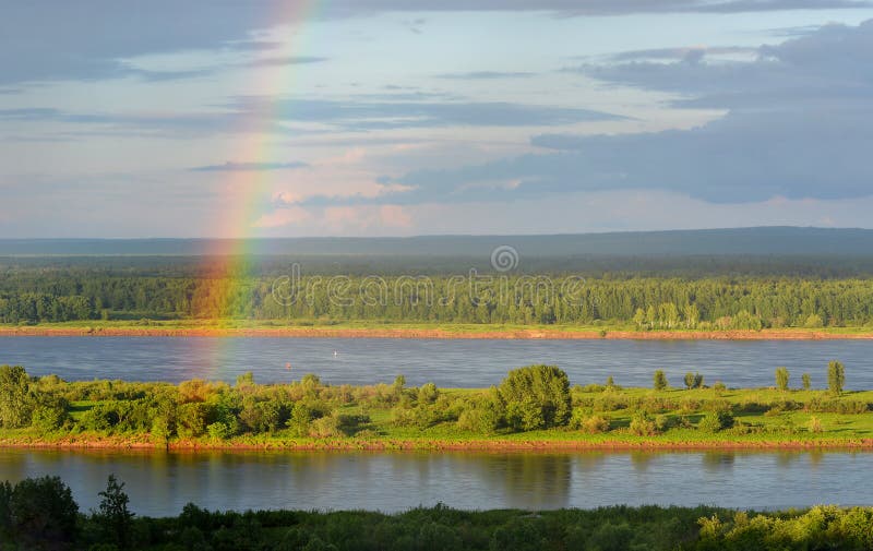 Rainbow Over the River and Forest. Bright Rainbow Stock Photo - Image ...
