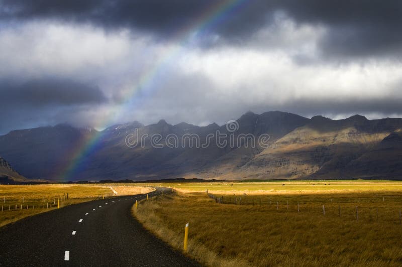 Rainbow Over a Rural Road - Iceland Stock Photo - Image of colors ...