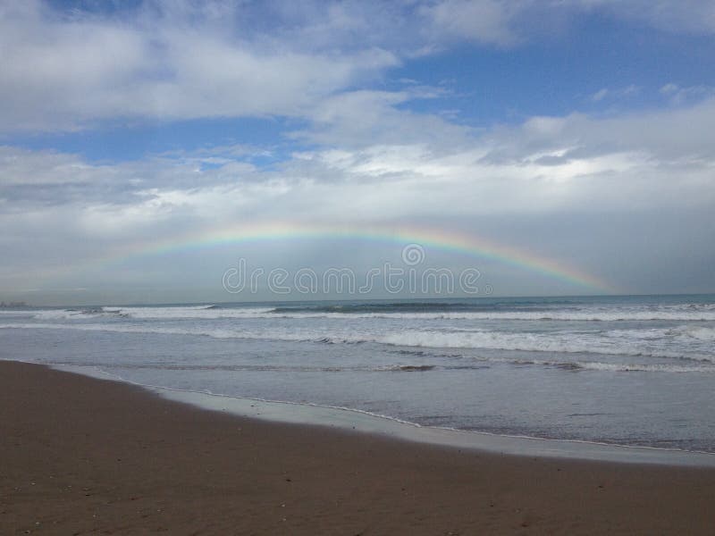Rainbow over the sea stock image. Image of rainbow, landscape - 51027623
