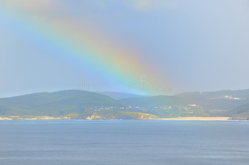 Rainbow over sea no.3 stock photo. Image of strand, colors - 7613778