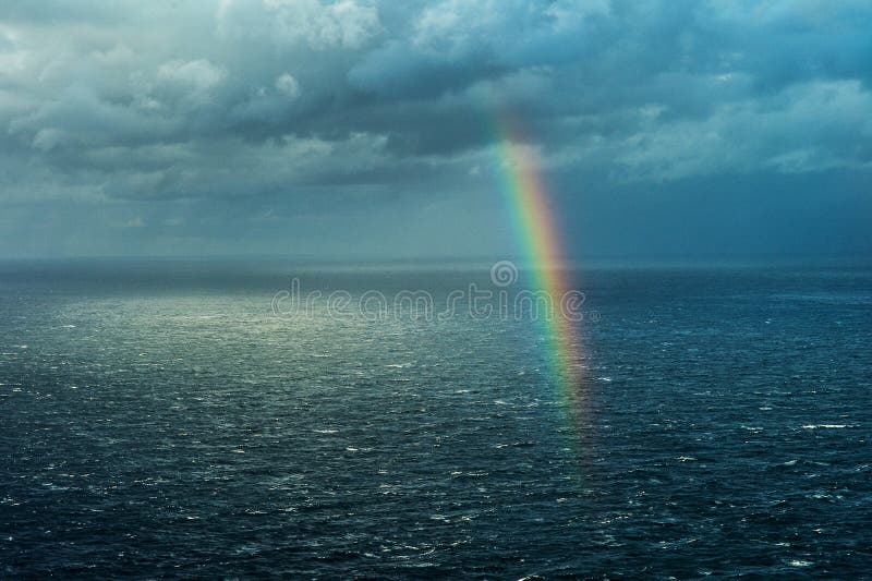 Rainbow over the sea stock photo. Image of view, world - 120459646